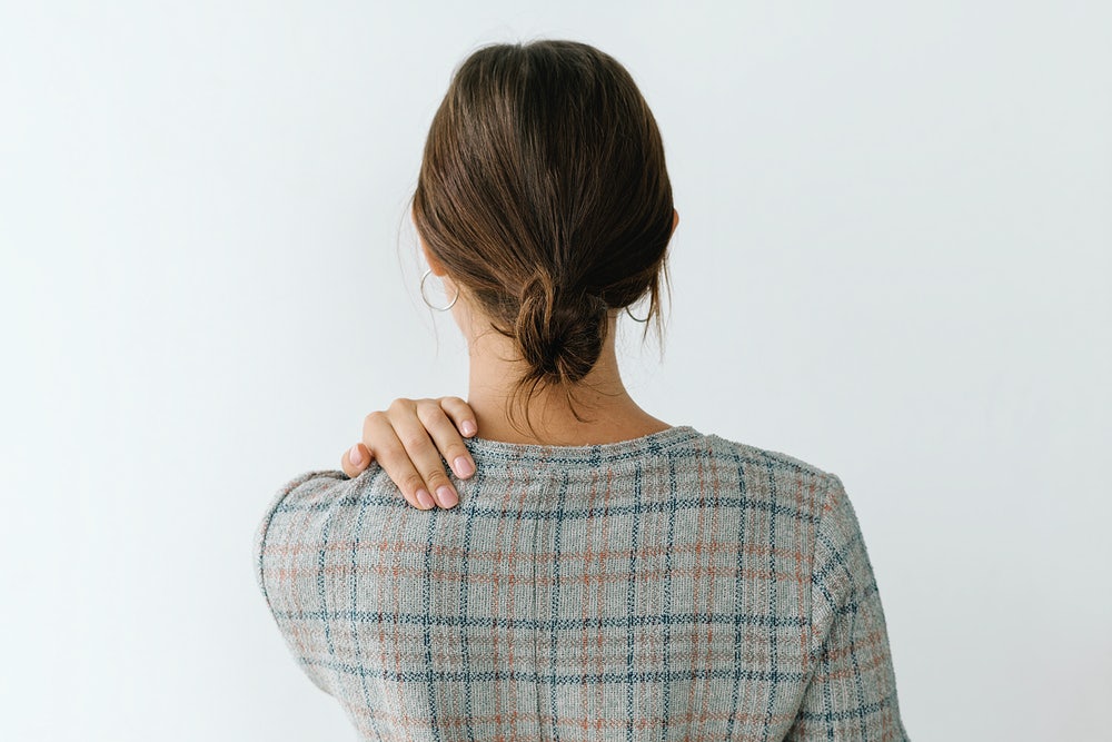 4 Basic Stretches For Your Traps to Release Tension - Trainerize.me